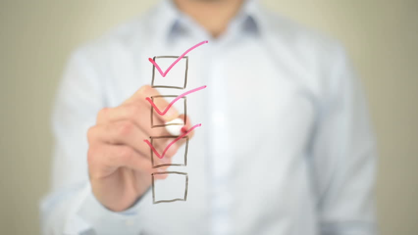 A Person Checking Off A To Do List Stock Footage Video 3487634 a-person-checking-off-a-to-do-list-stock-footage-video-3487634