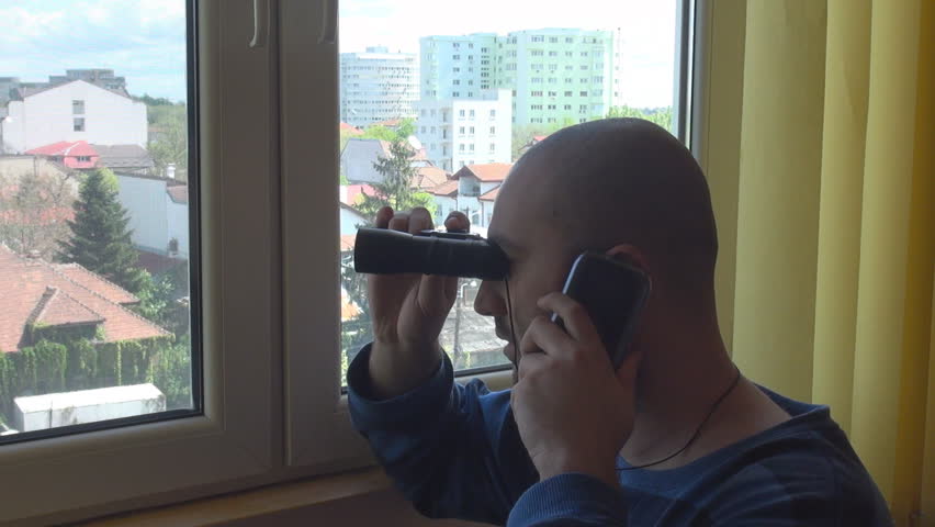 Nasty Neighbor With Binocular Spying People Behind Apartment Window Coward Stock Footage Video