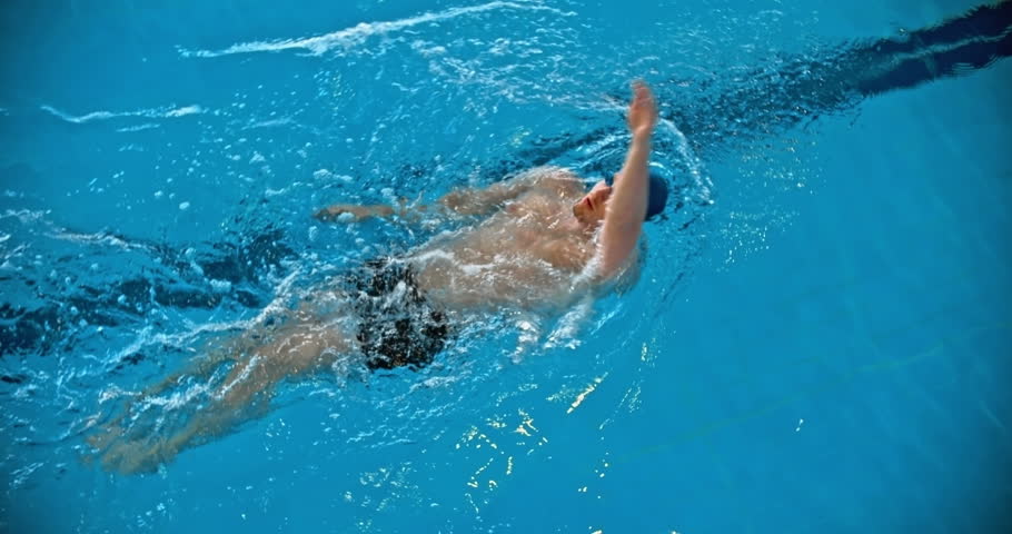 Woman In Blue Bathing Suit Swimming Underwater In Slow Motion Stock ...