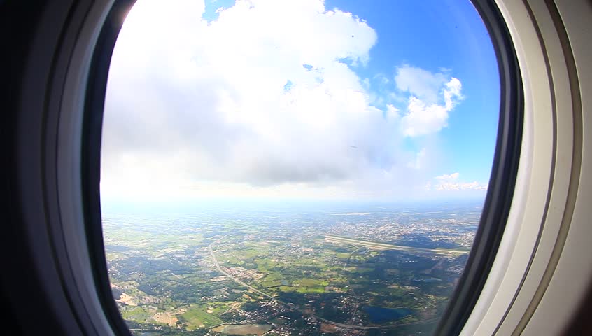 Looking Out The Window Of An Airplane As Clouds Pass By. Stock Footage ...