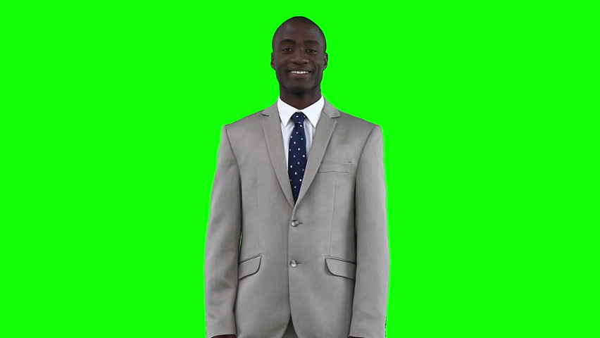 African American Businessman In Front Of A Green Screen Making Hand ...